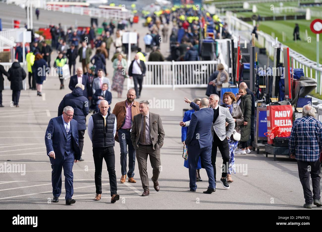 Racegoers arrive during day one of the Randox Grand National Festival ...