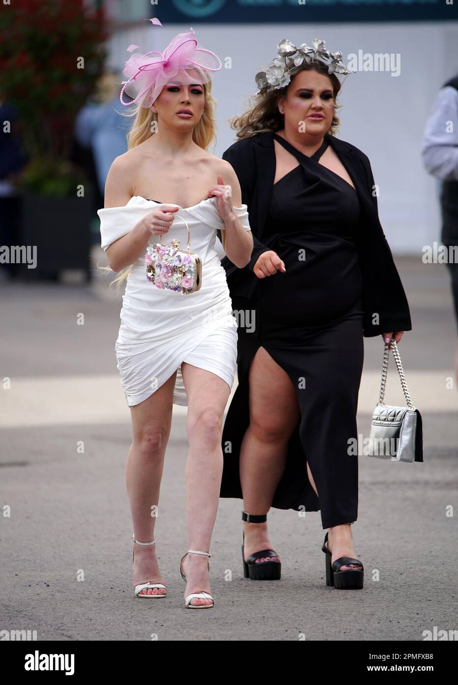 Racegoers arrive for day one of the Randox Grand National Festival at ...