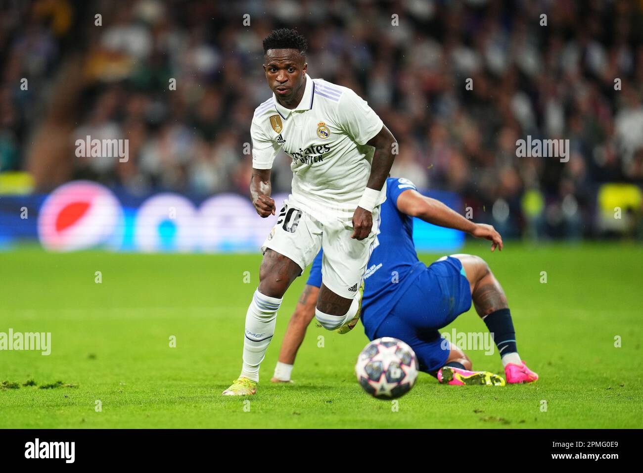 Madrid, Spain. 12/04/2023, Vinicius Jr of Real Madrid and Reece James of Chelsea FC during the ...