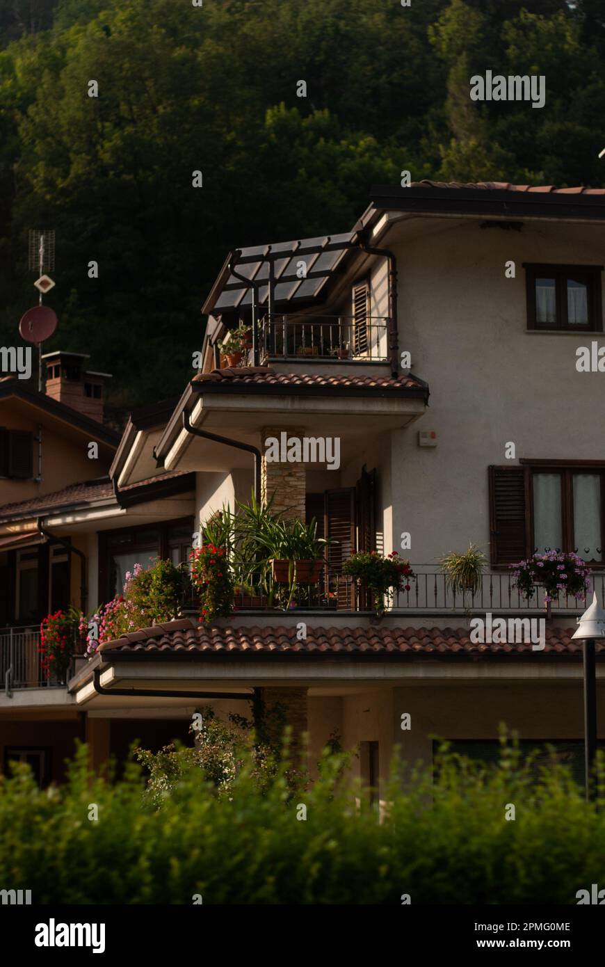 View on building in mountains in Alps Stock Photo - Alamy