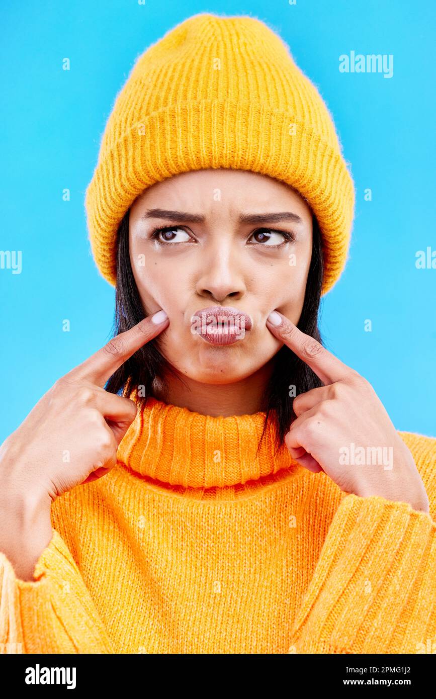 Quirky, goofy and young female in a studio with a comic, funny and ...