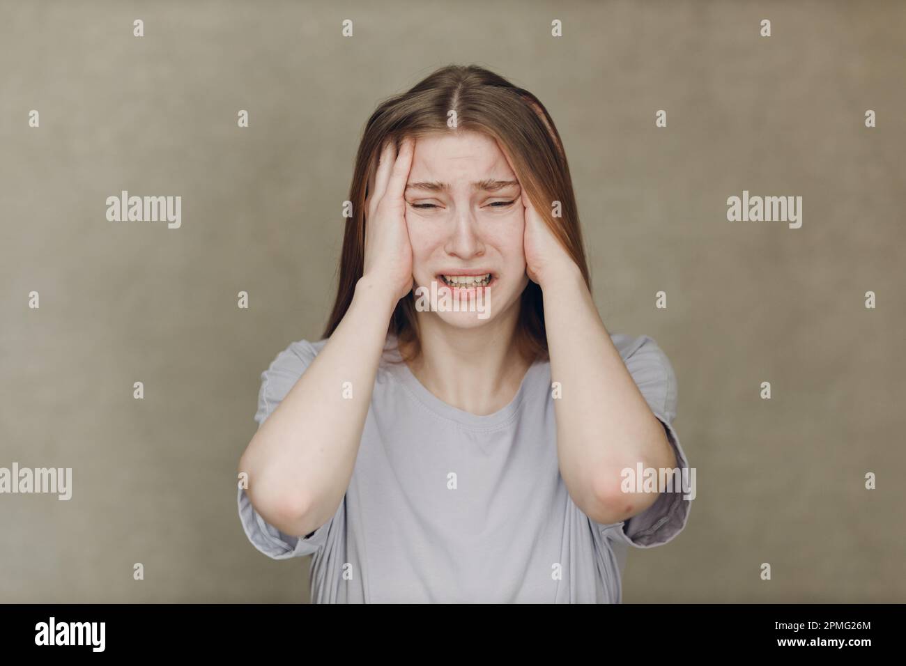 Portrait of young caucasian actress crying upset woman looking at ...