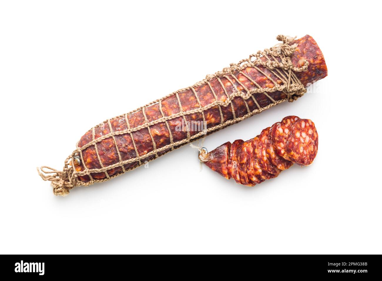 Smoked sausage. Sliced salami isolated on the white background Stock Photo - Alamy