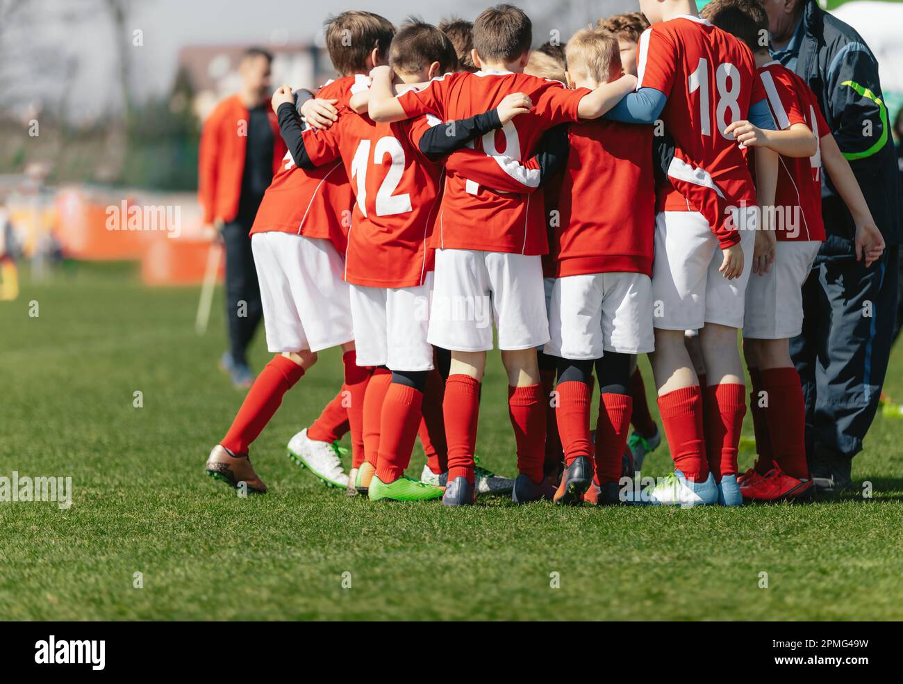 Youth Team Huddle. Sports Players in a Team Meeting With Coach at ...