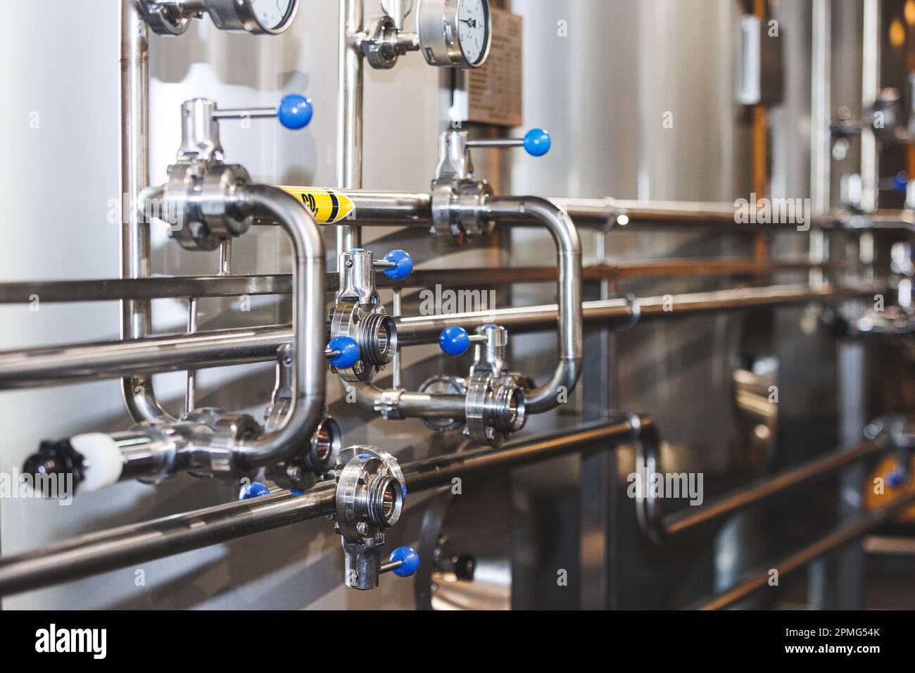 Beer brewing . Commercial brewing equipment close up shot. Industrial ...