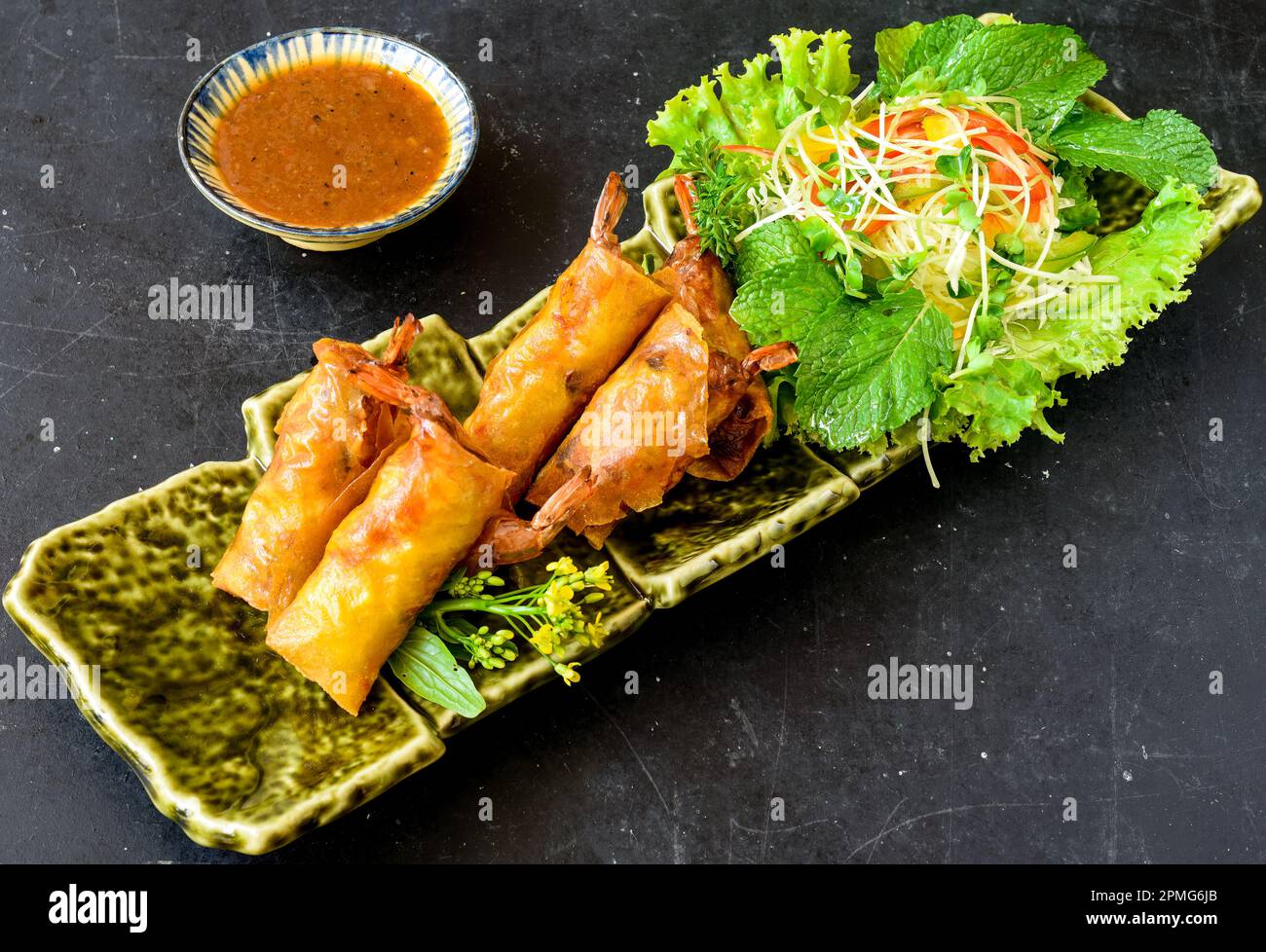 Traditional fried vietnamese spring rolls with pork, shrimp, rice paper ...