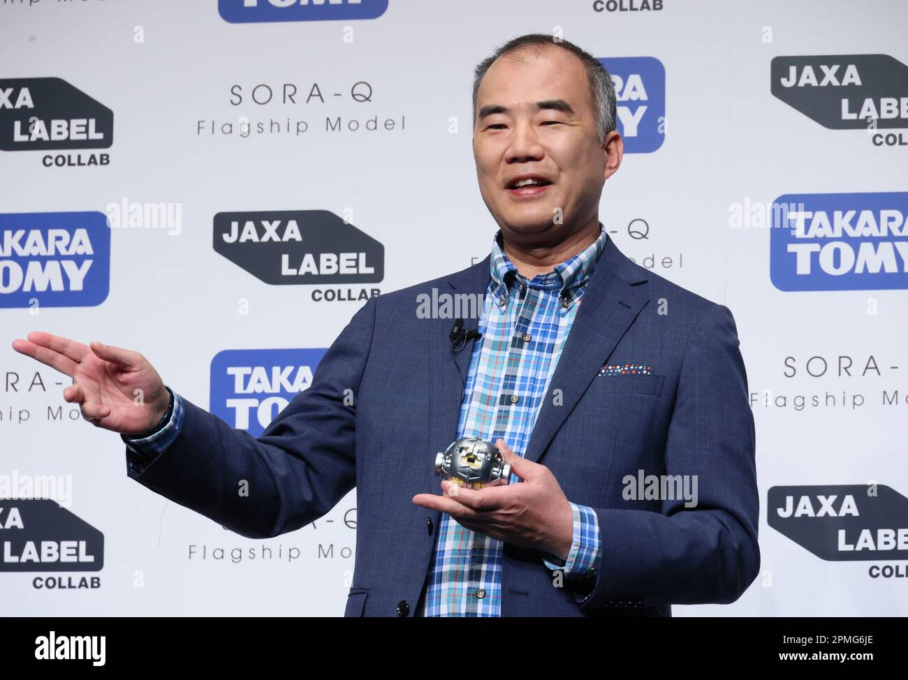 Tokyo, Japan. 13th Apr, 2023. Former Japanese astronaut Soichi Noguchi displays "Sora-Q Flagship ...