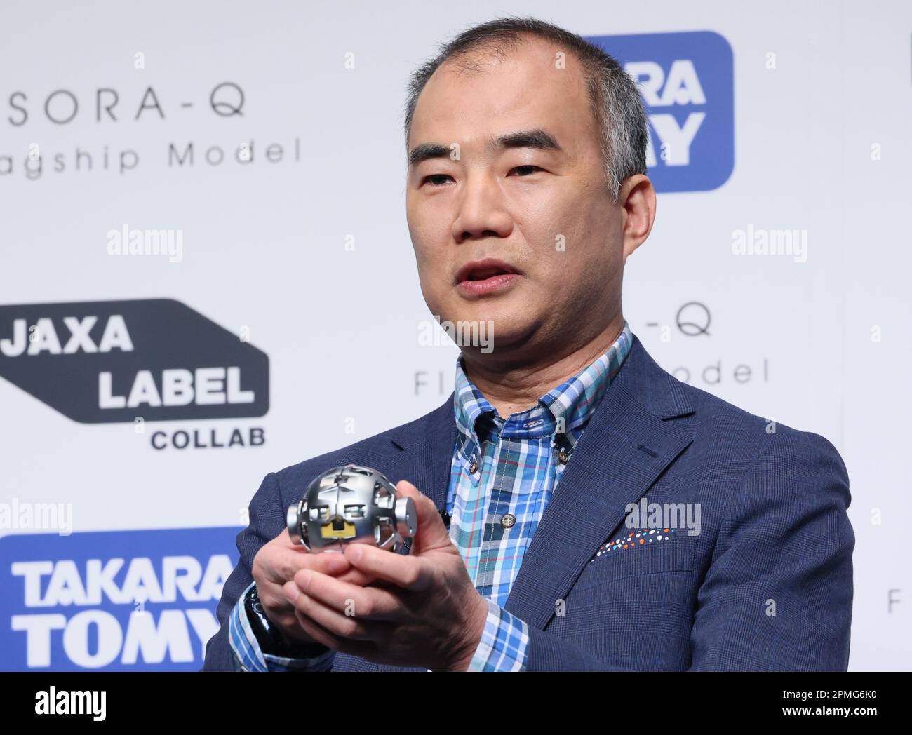 Tokyo, Japan. 13th Apr, 2023. Former Japanese astronaut Soichi Noguchi displays "Sora-Q Flagship ...