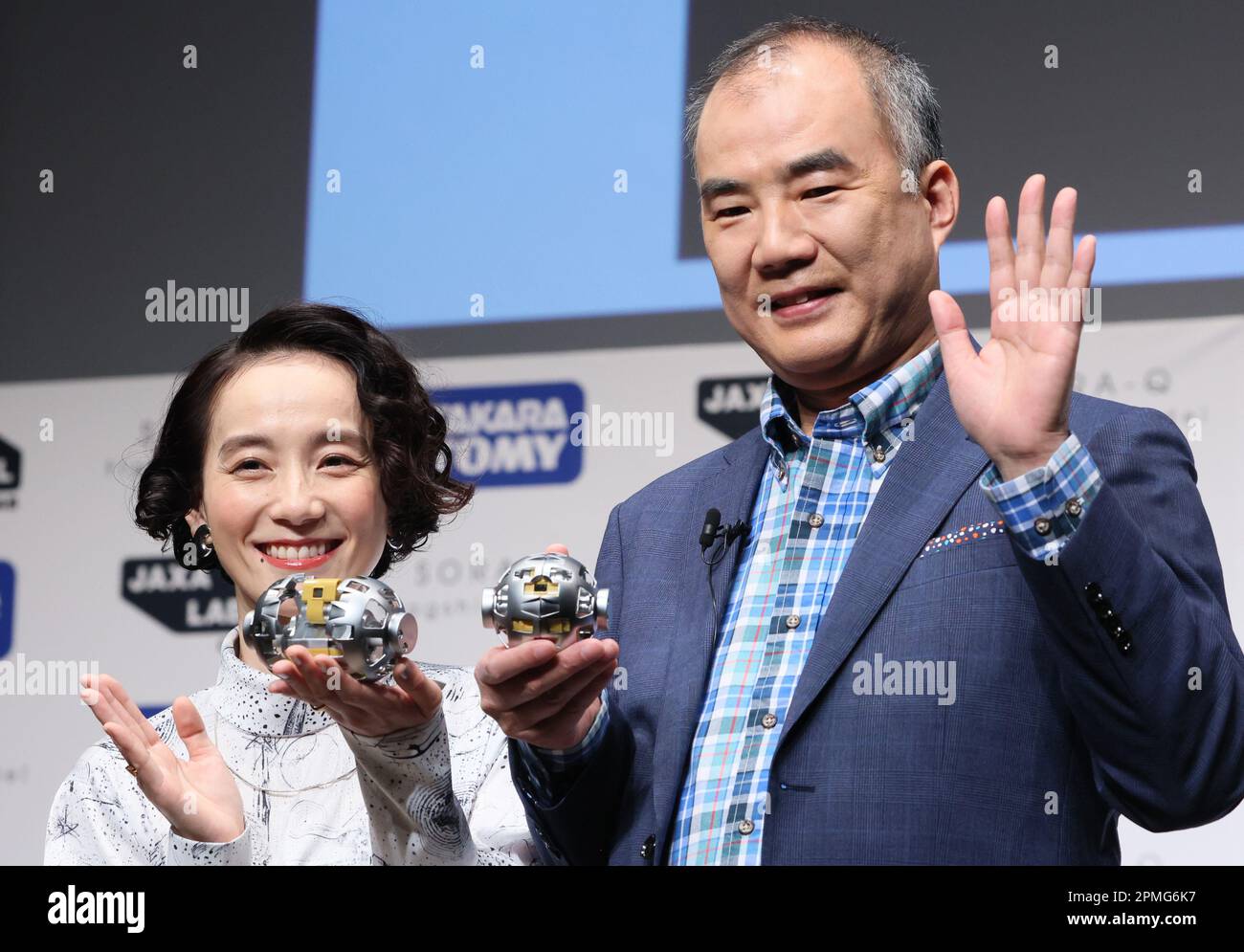 Tokyo, Japan. 13th Apr, 2023. Former Japanese astronaut Soichi Noguchi (R) and artist Tomoe ...