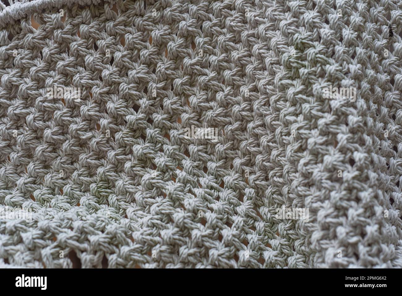 Various knots of macrame technique made of white threads Stock Photo ...