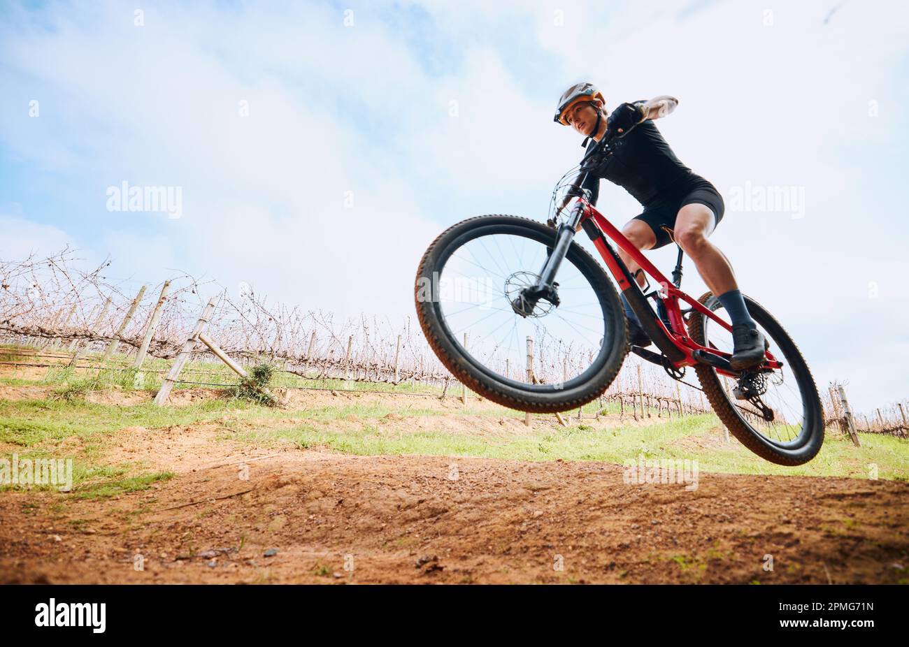 Female bike jump hi-res stock photography and images - Alamy