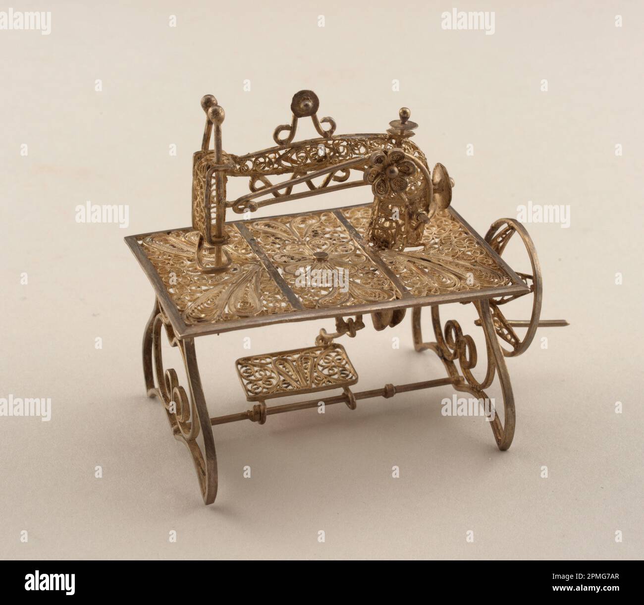 Sewing machine Miniature; Italy; silver Stock Photo - Alamy
