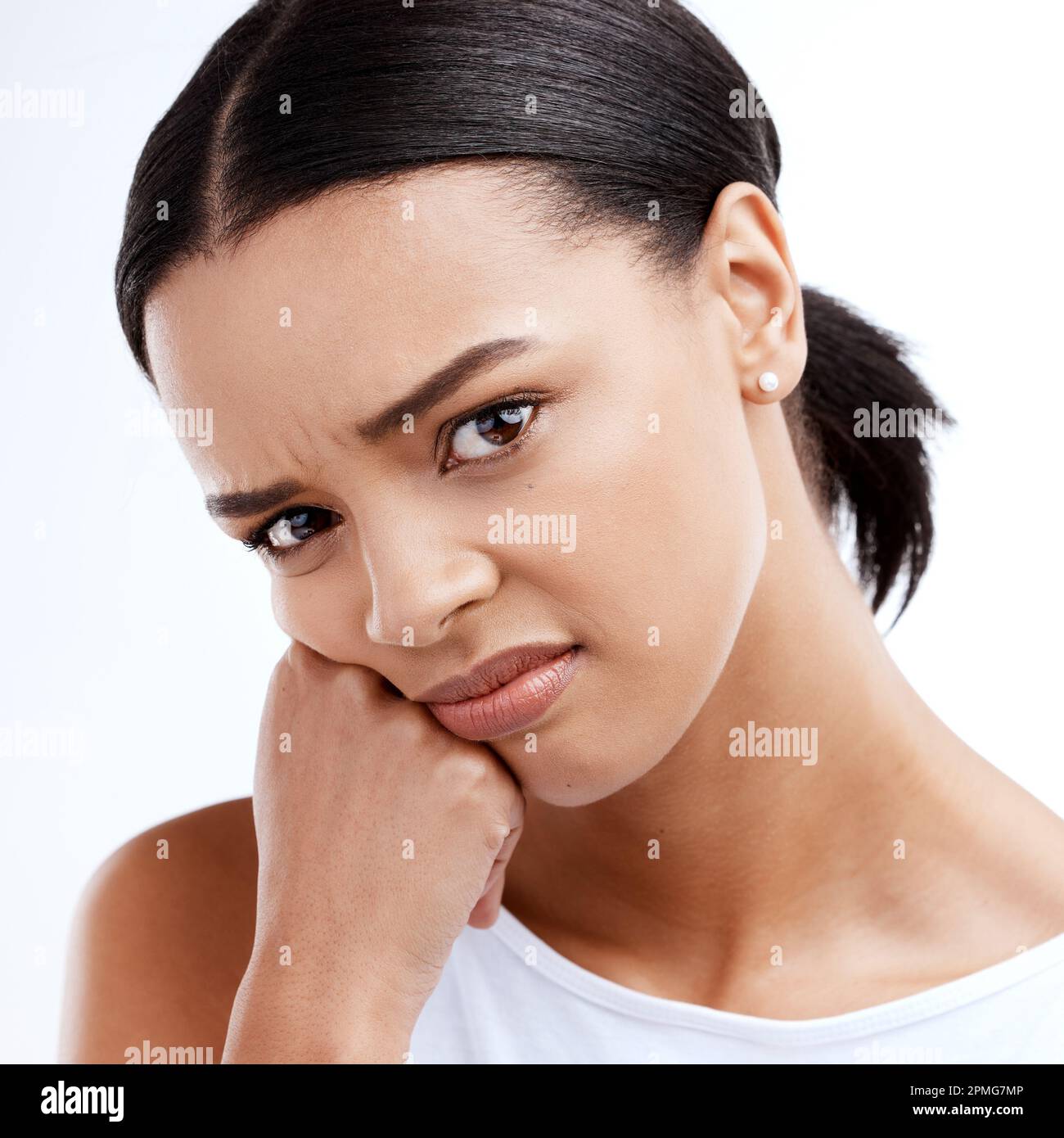 Portrait, unhappy and frustrated with a woman in studio isolated on a ...