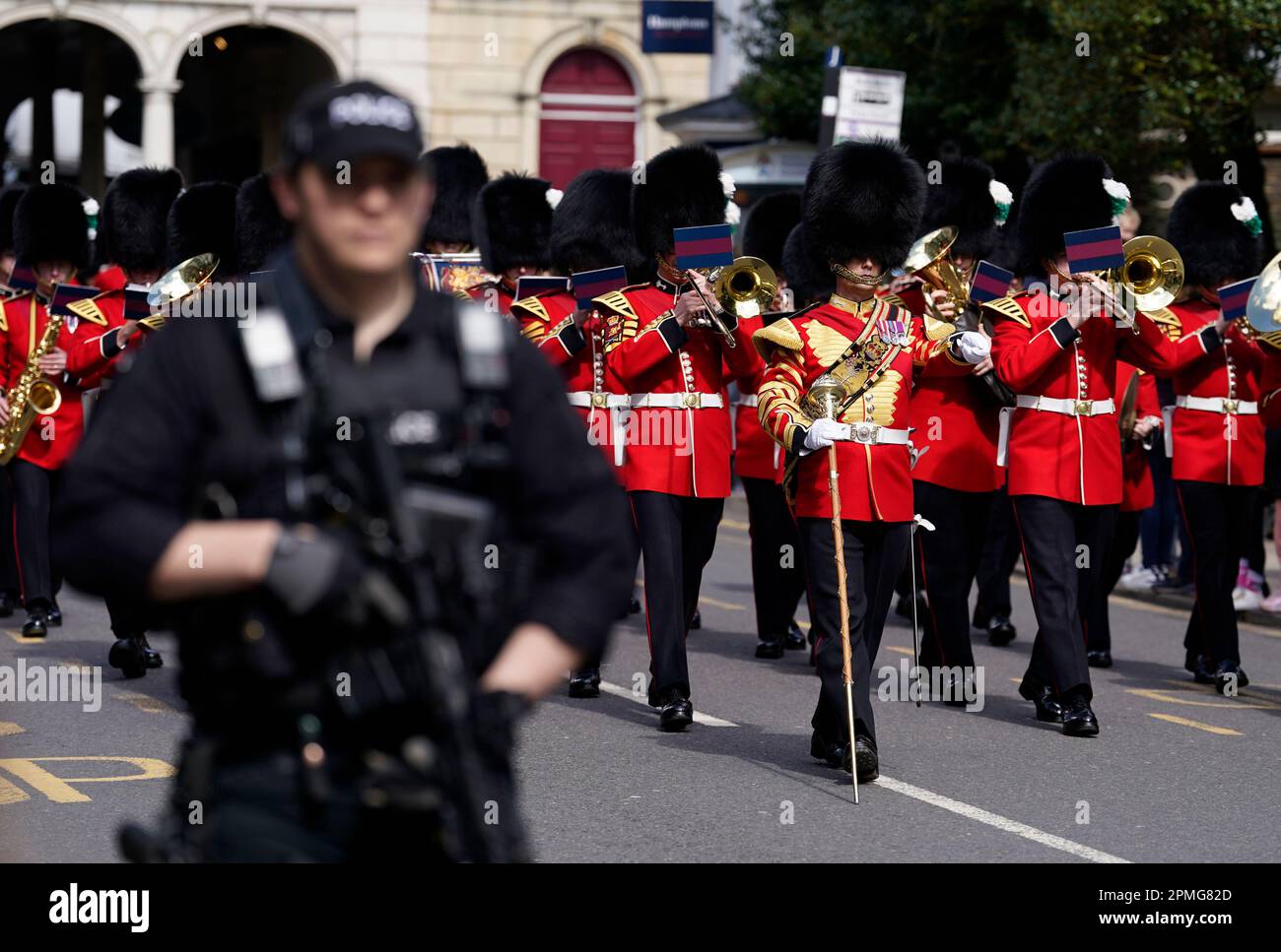 The band of the Welsh Guards march down the High Street towards ...