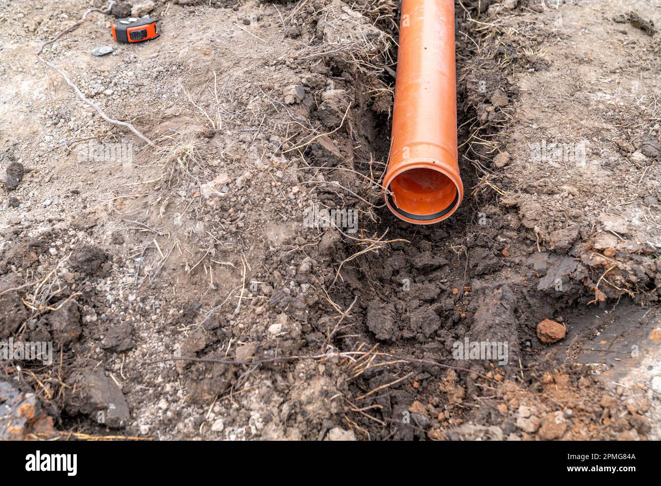 plastic pvc waste sewer pipe in the ground. construction site Stock ...