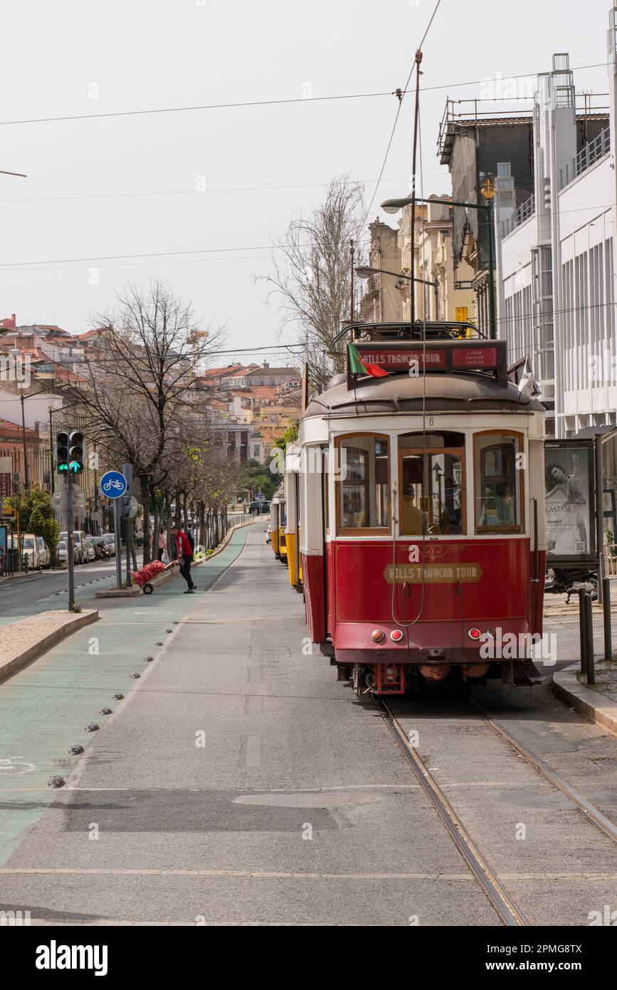 Portugal Street with buildings and tramway rails Stock Photo - Alamy