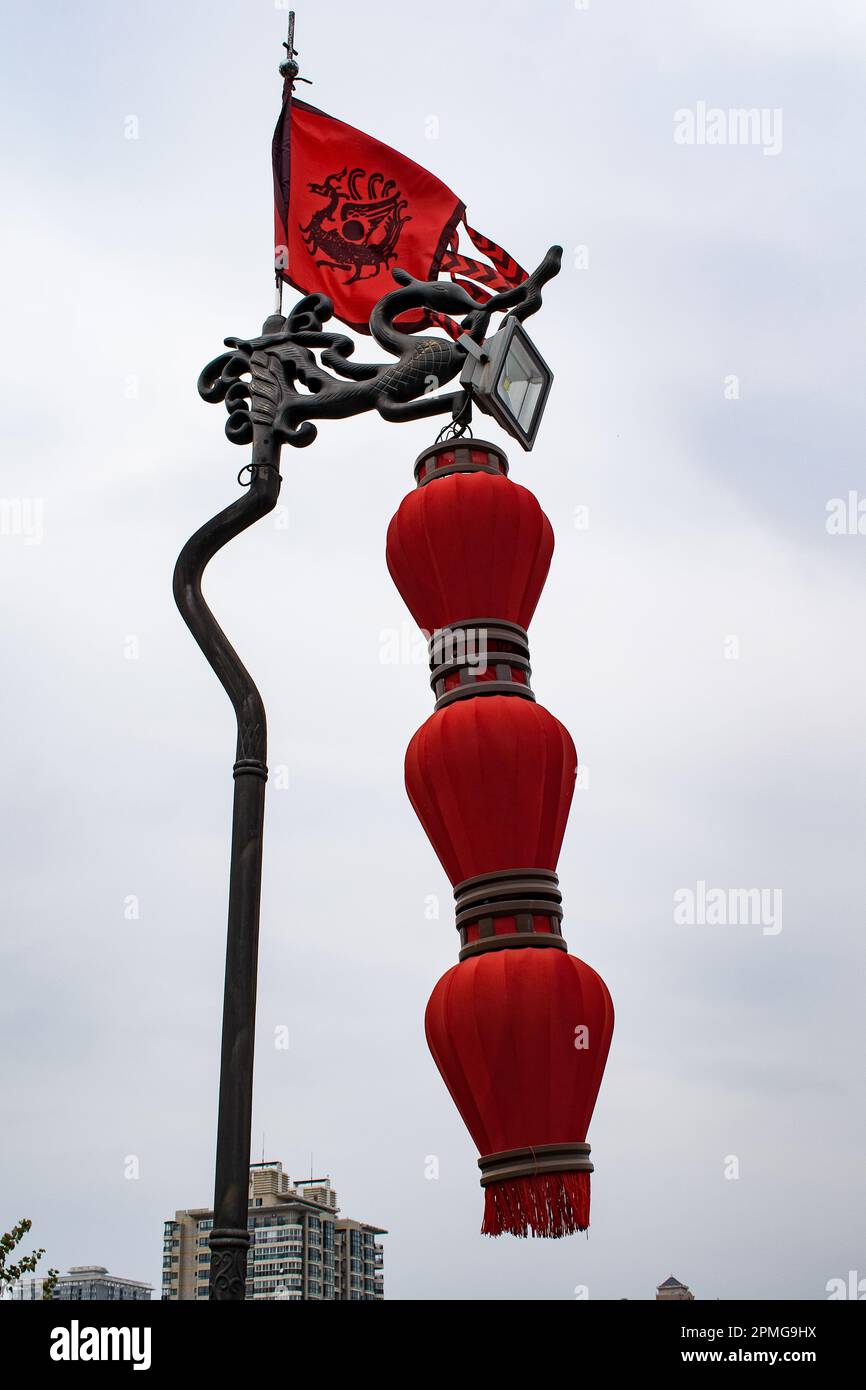 A street lamp on the Xi'an city wall decorated with red Chinese ...