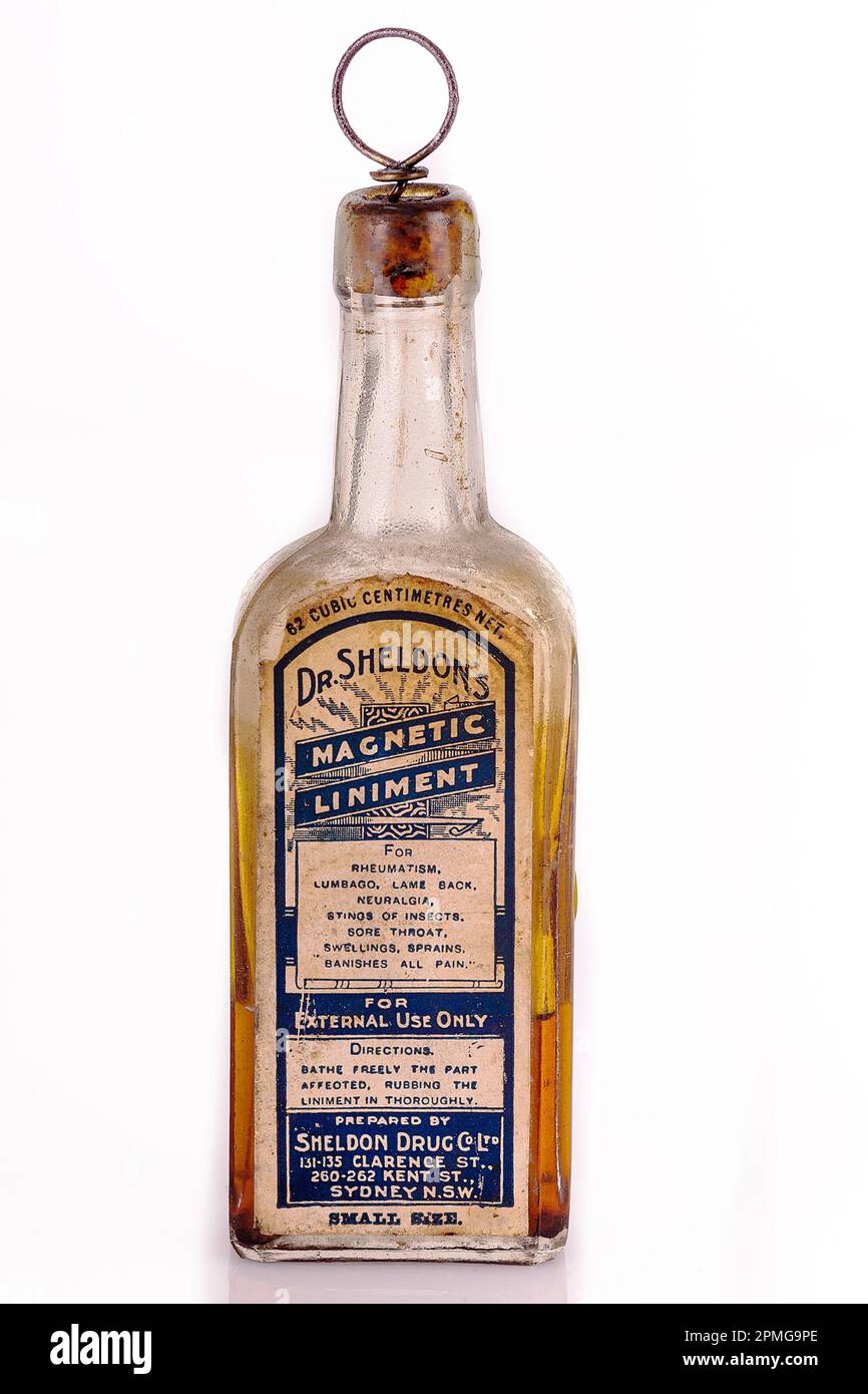 Close up of old fashioned drug bottle with label, isolated on white ...