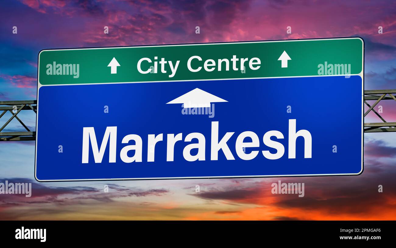 Road sign indicating direction to the city of Marrakesh Stock Photo - Alamy