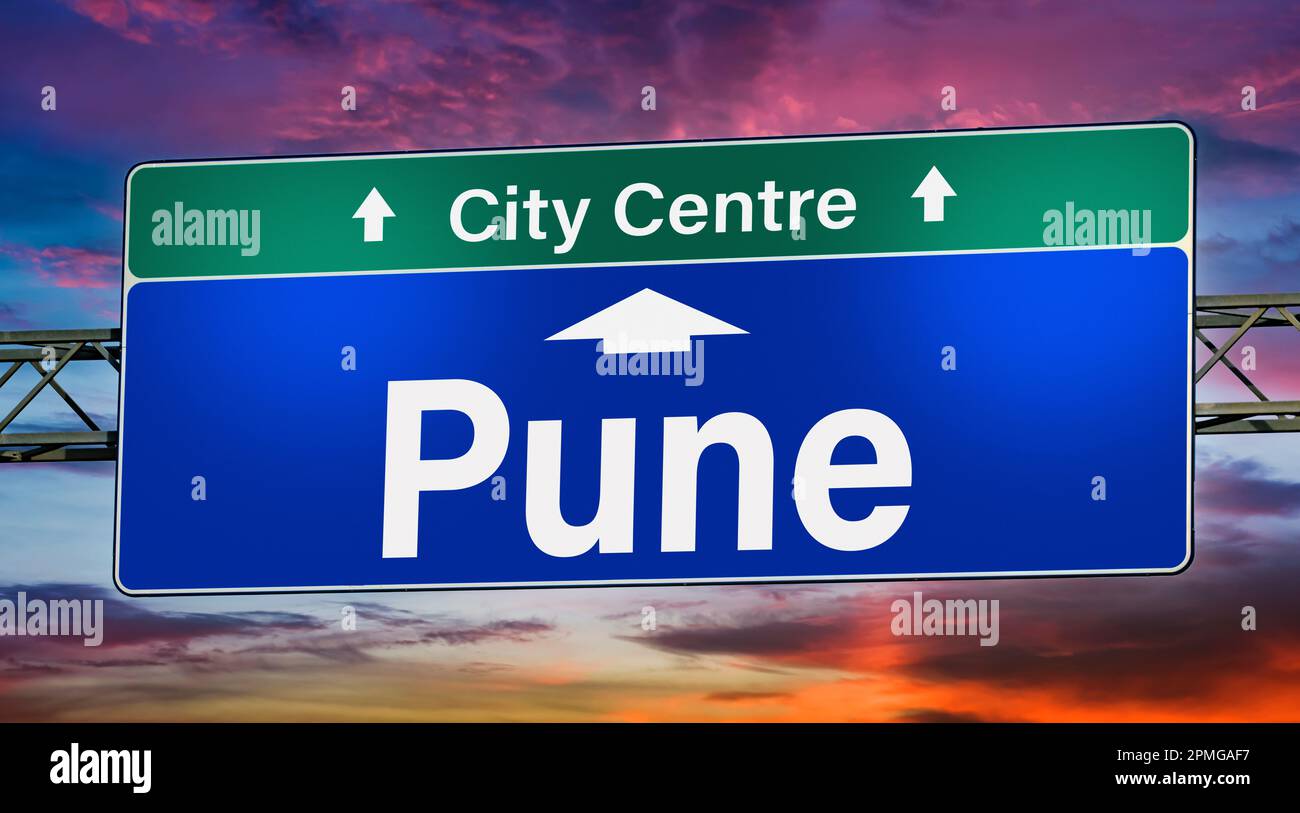 Road sign indicating direction to the city of Pune Stock Photo - Alamy