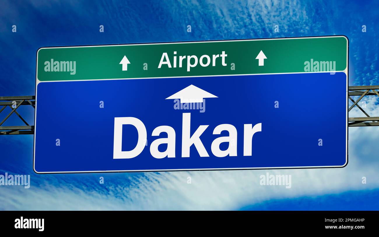 Road sign indicating direction to the city of Dakar Stock Photo - Alamy