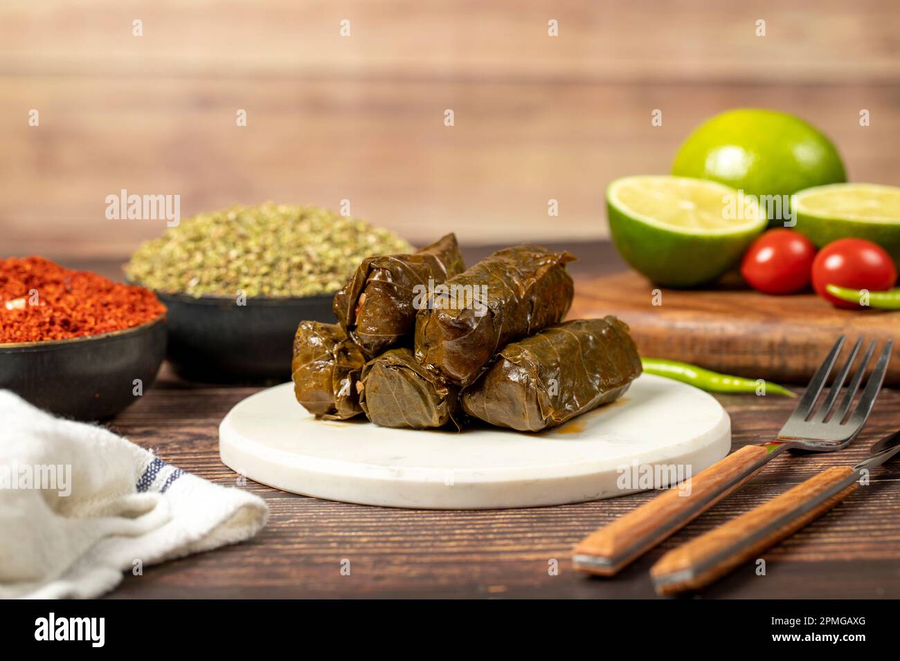 Olive oil leaf wrap. Aegean cuisine delicacies. Grape leaf wrap with ...