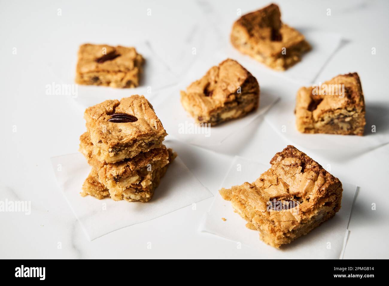 blondie cookies squares on white marble countertop background. White ...