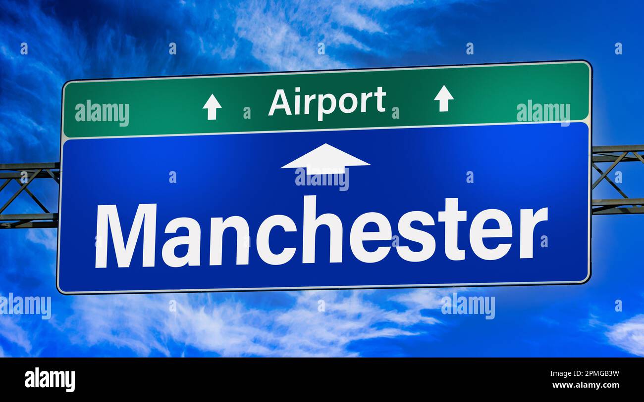 Road sign indicating direction to the city of Manchester Stock Photo ...