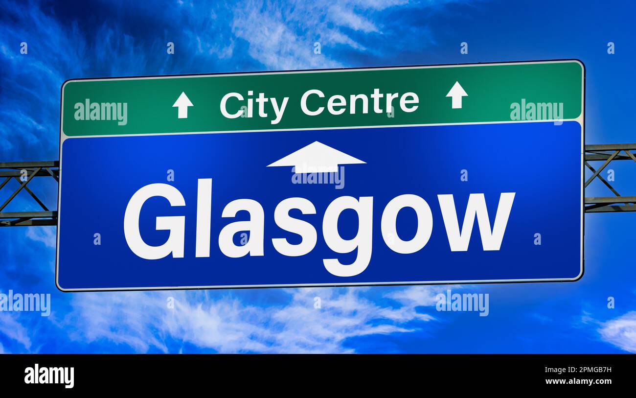 Road sign indicating direction to the city of Glasgow Stock Photo - Alamy