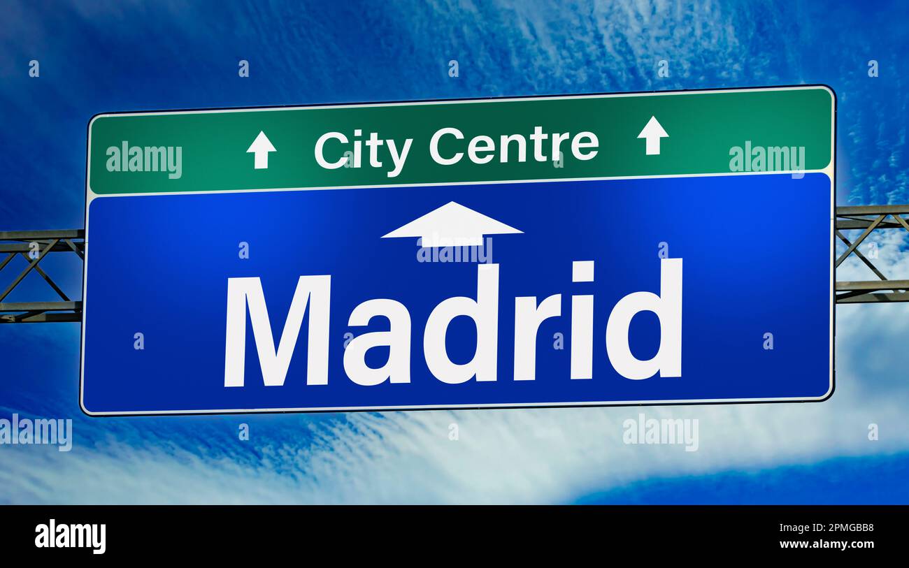 Road sign indicating direction to the city of Madrid Stock Photo - Alamy