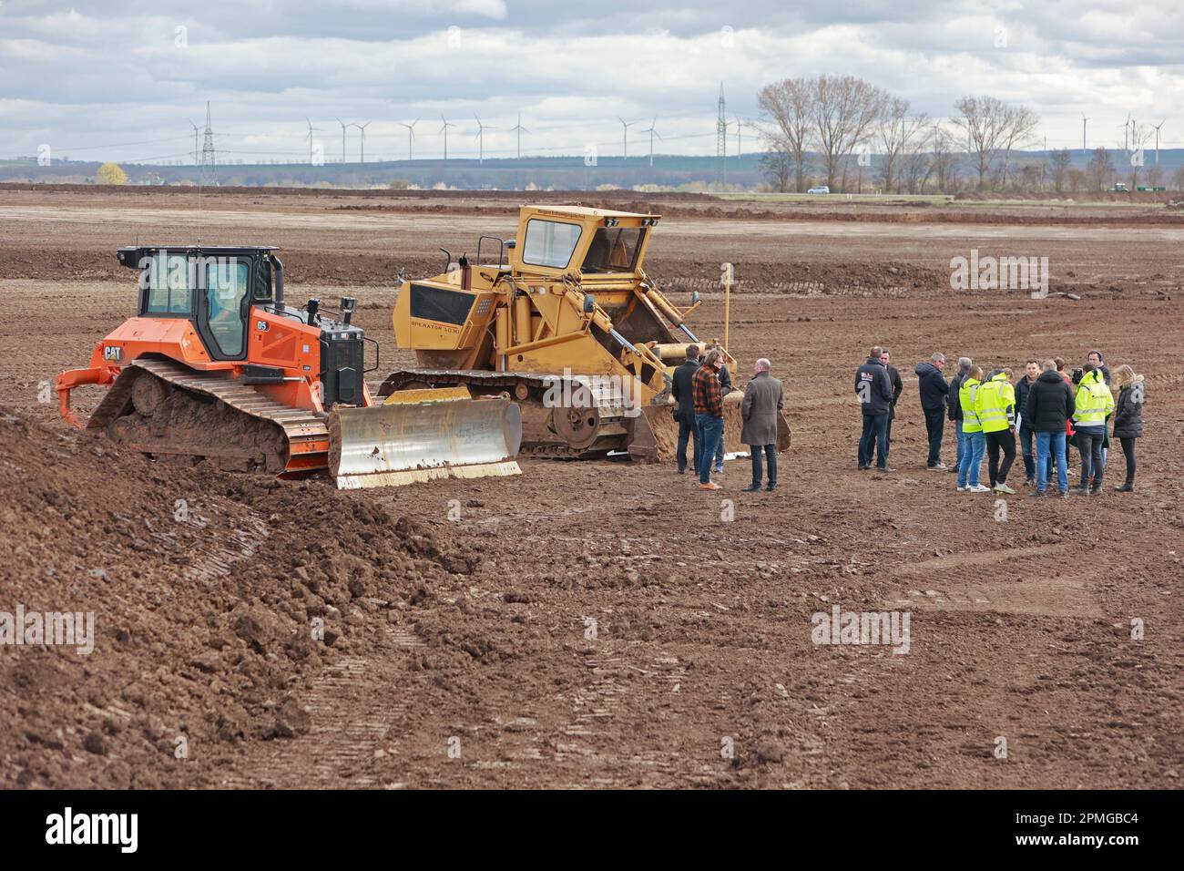 13 April 2023, Saxony-Anhalt, Halberstadt: Heavy construction vehicles ...
