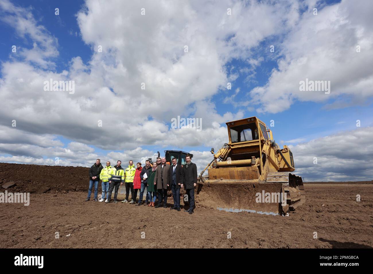 13 April 2023, Saxony-Anhalt, Halberstadt: Heavy construction vehicles ...