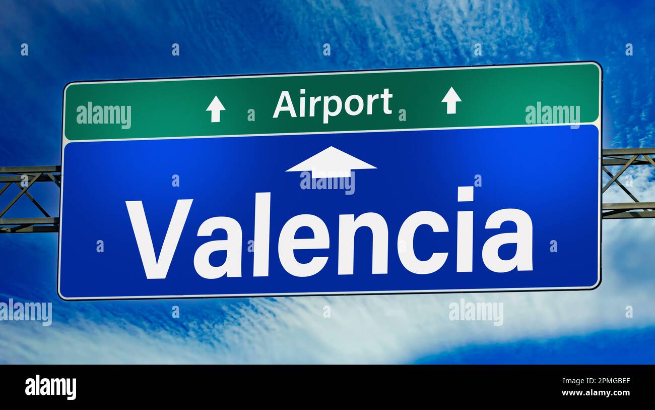 Road sign indicating direction to the city of Valencia Stock Photo - Alamy