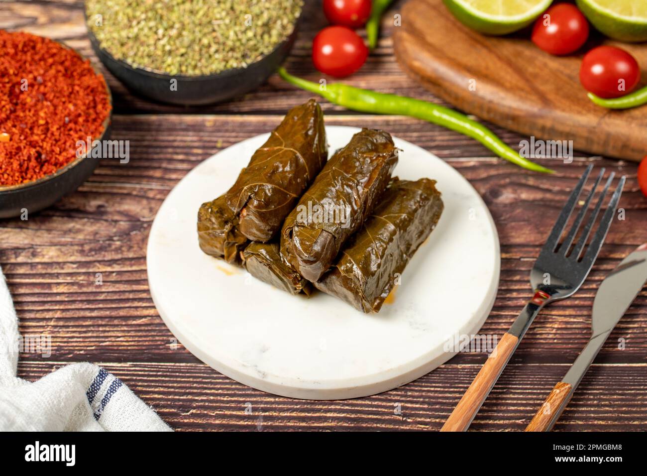 Olive oil leaf wrap. Aegean cuisine delicacies. Grape leaf wrap with ...