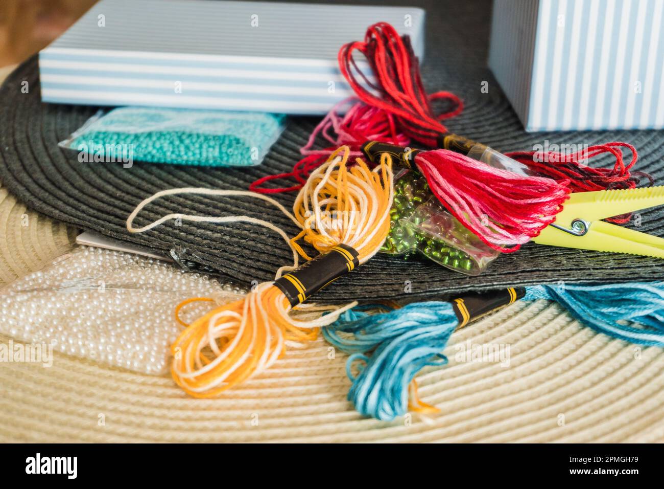 Threads and colorful materials to make bracelets Stock Photo - Alamy