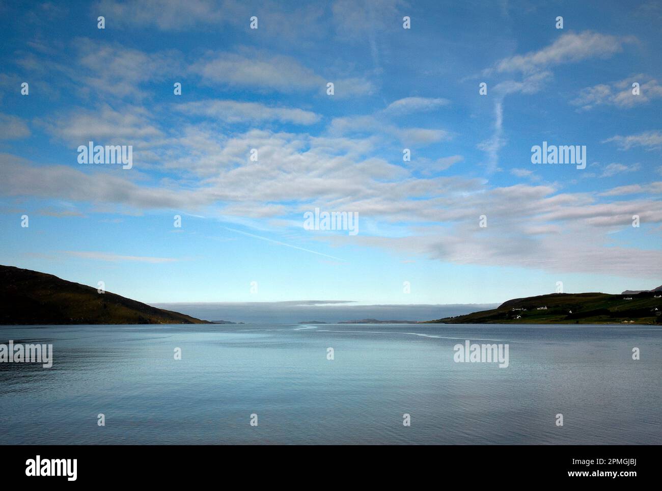 Colour photograph of a loch and headlands, Loch Broom, Ullapool ...