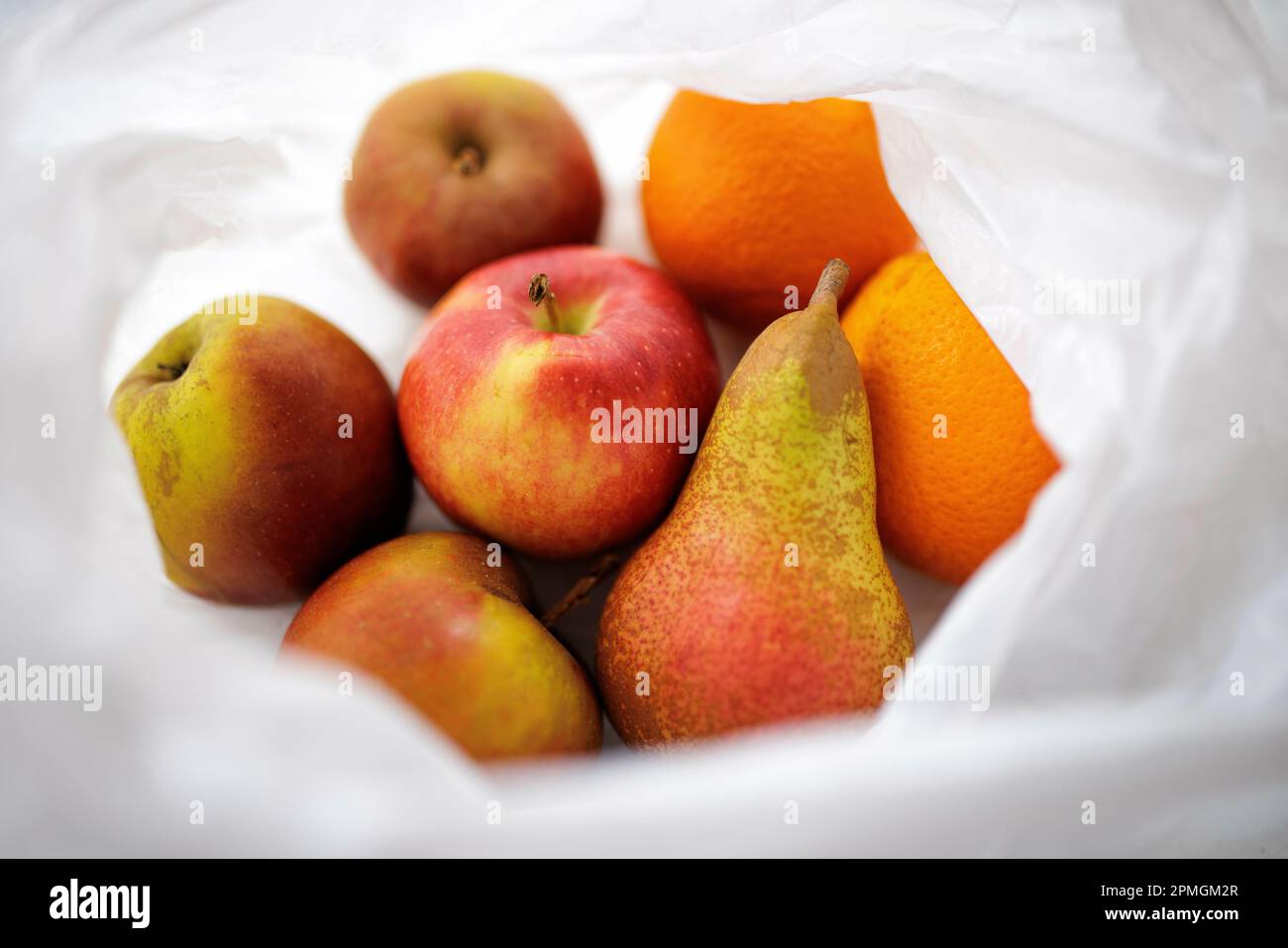 Symbolic image on the subject of nutrition and packaging waste. Fresh ...