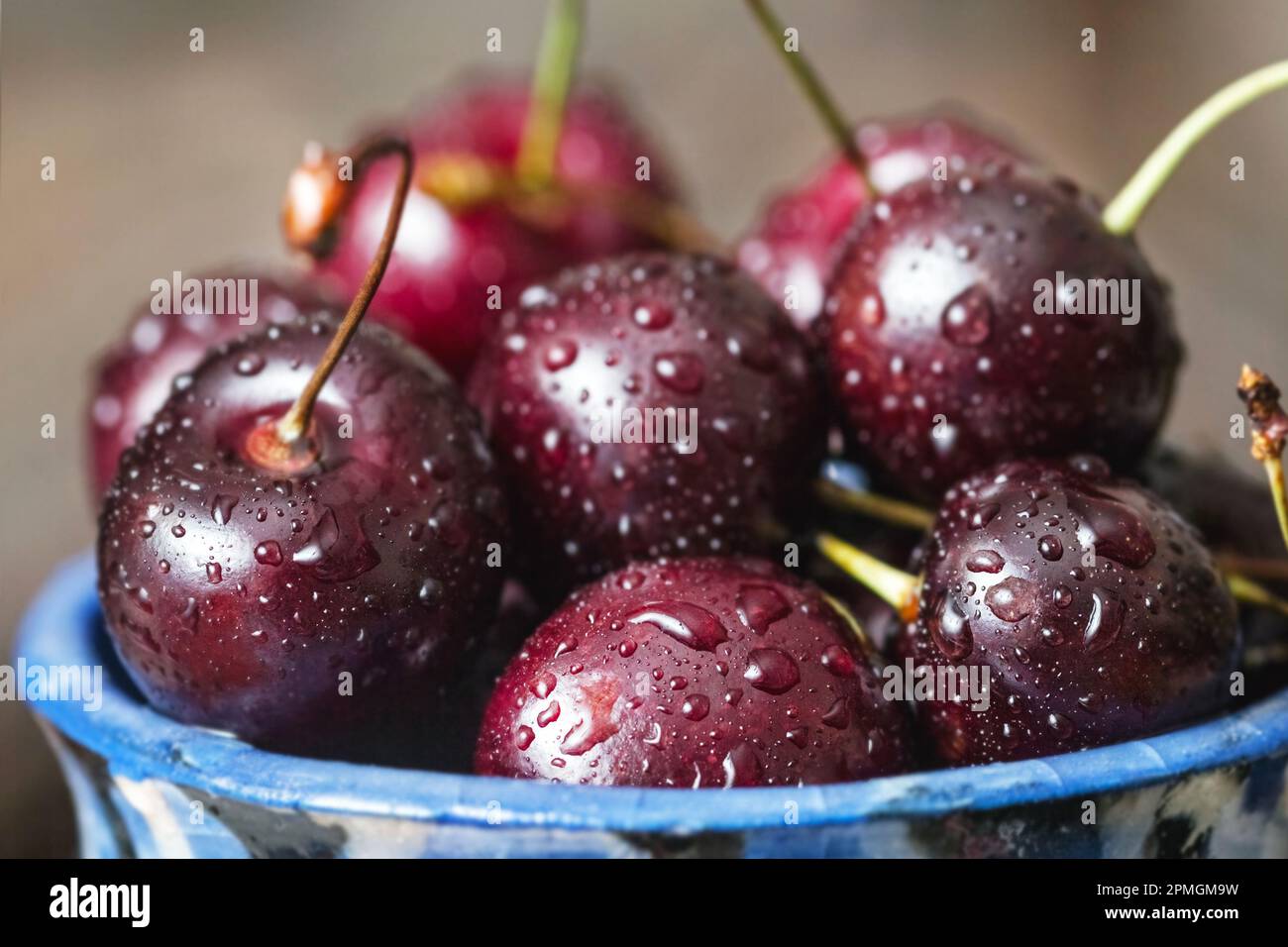 Real pretty fresh cherry berries in drops of clear water Stock Photo ...