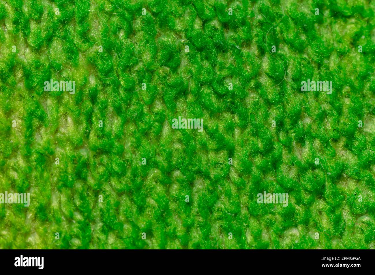 Dark green background from a textile material with wicker pattern ...