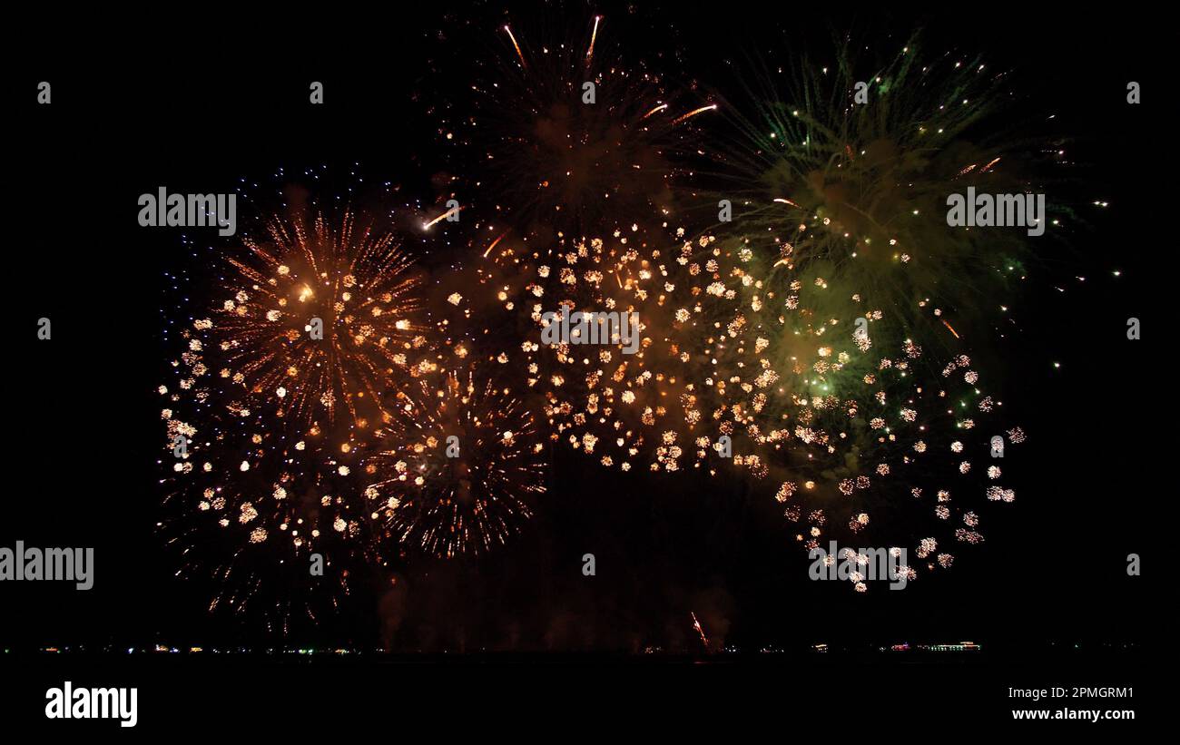Abstract colored real firework background with big shining glowing ...