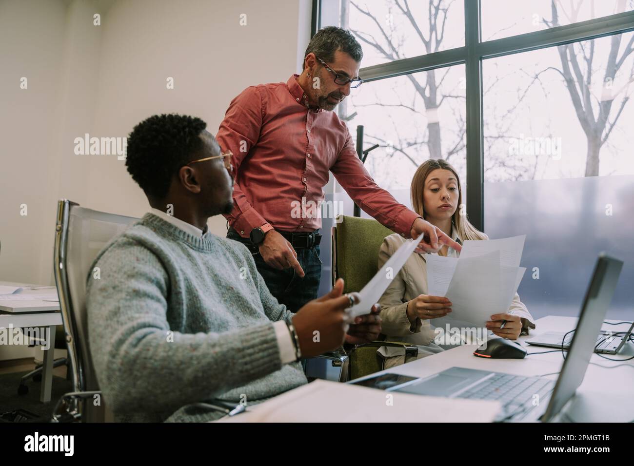 Two office employees overwhelmed by the tasks their boss gave them ...