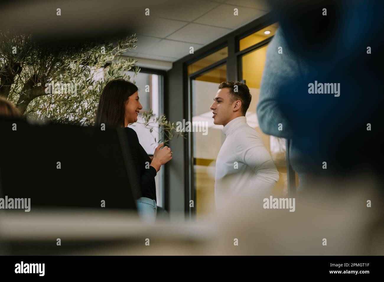 Explaining something funny hi-res stock photography and images - Alamy