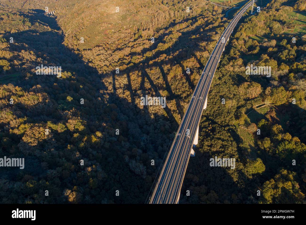 drone aerial view of a high speed railway line on a bridge at sunset Stock Photo - Alamy