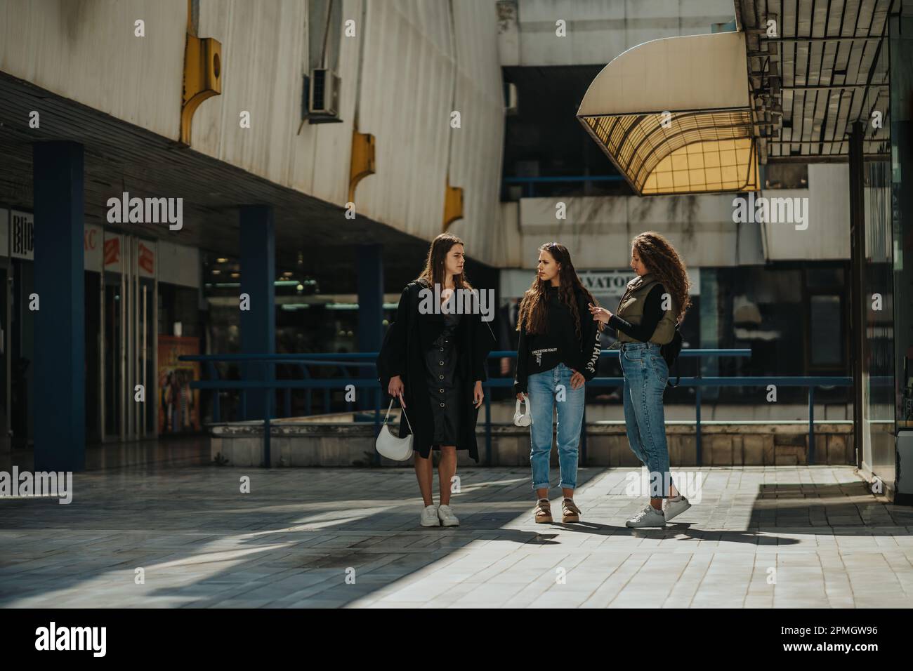 Girls Standing At Mall