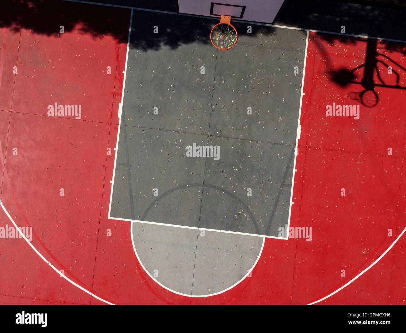 aerial view of a basketball court painted red Stock Photo - Alamy