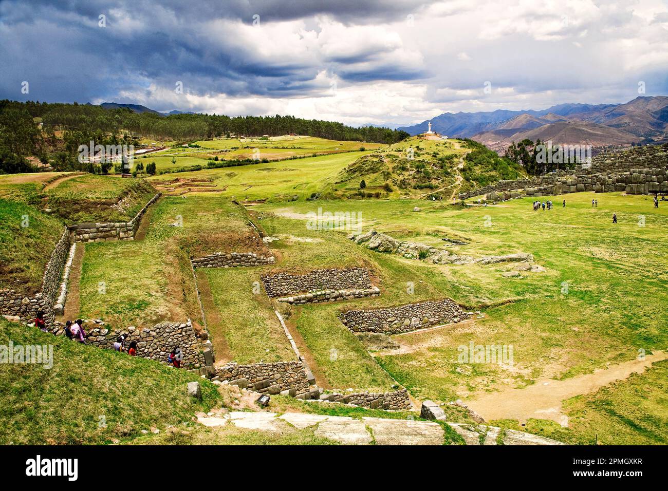 The ruins of Sacsayhuaman and the statue of Christ in the hills above ...