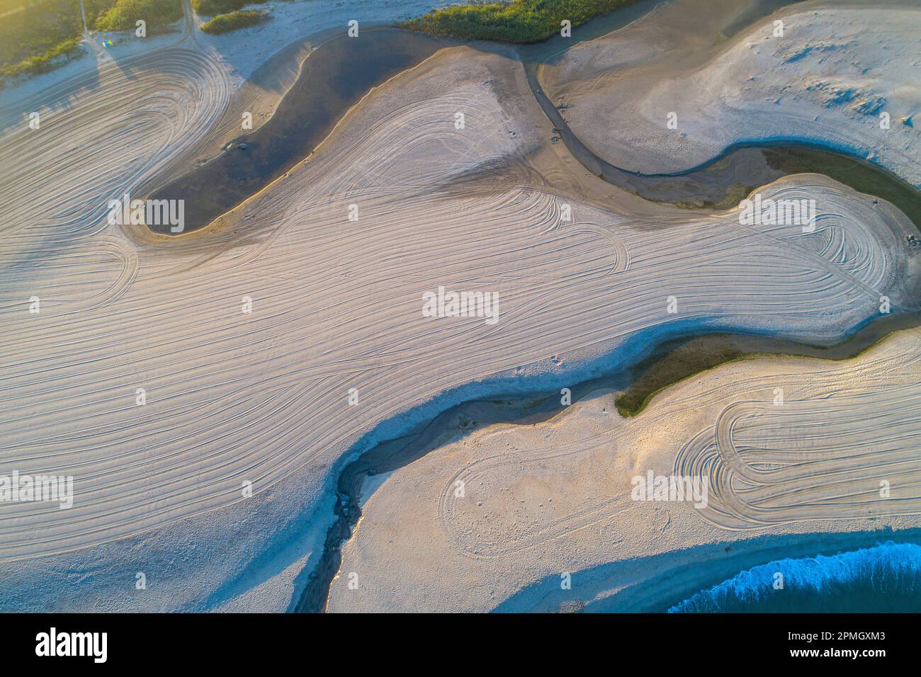 zenithal aerial view of a beach at dawn Stock Photo - Alamy