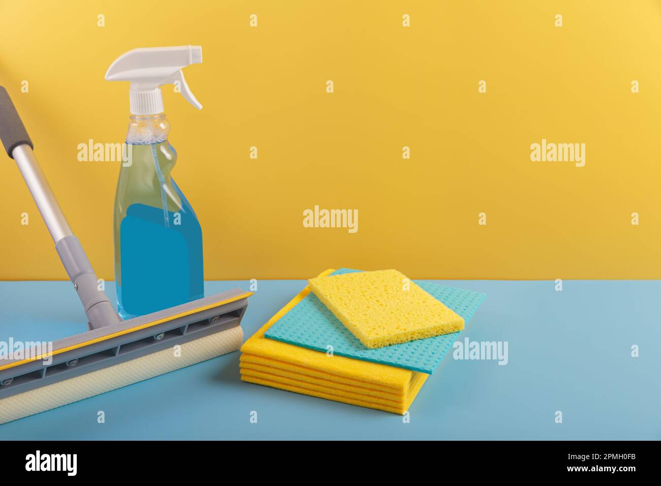 Set for cleaning windows on blue background Stock Photo - Alamy