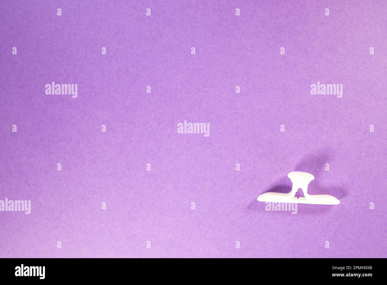 single plastic toggle fixing for plasterboard hollow walls isolated on ...