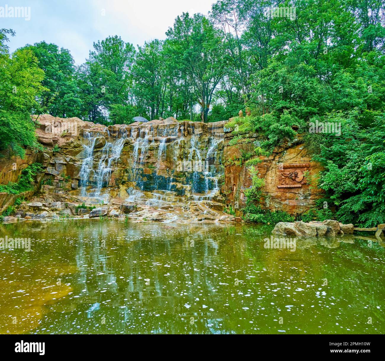 The Poseidon Trident waterfall among the lush greenery of Landscape ...